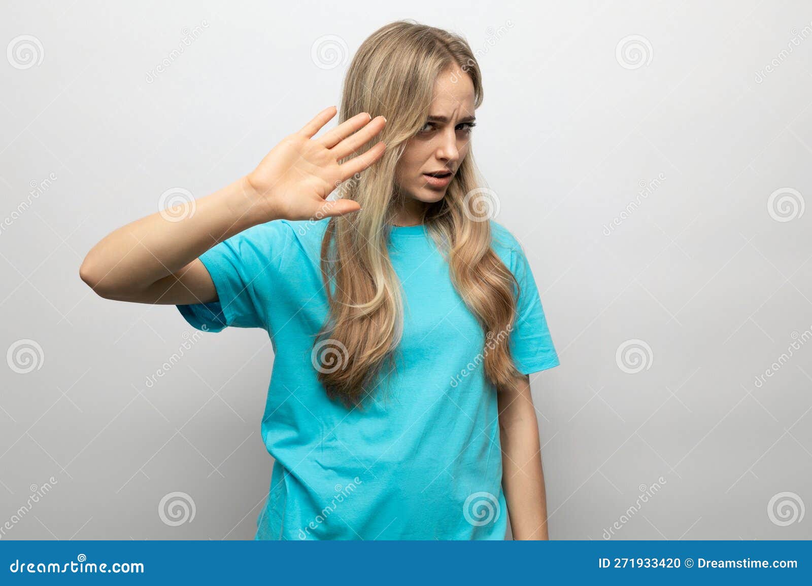 Blond Girl Showing Refusal on White Background Stock Photo - Image of ...