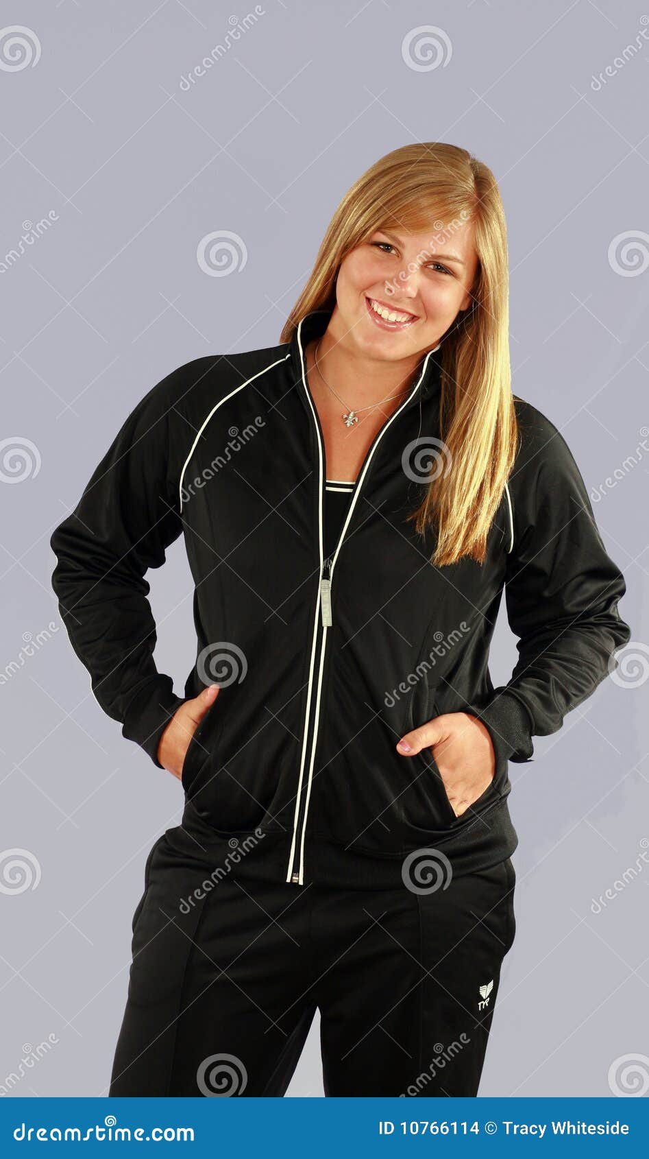 Blond girl in warm up suit stock photo. Image of happy - 10766114