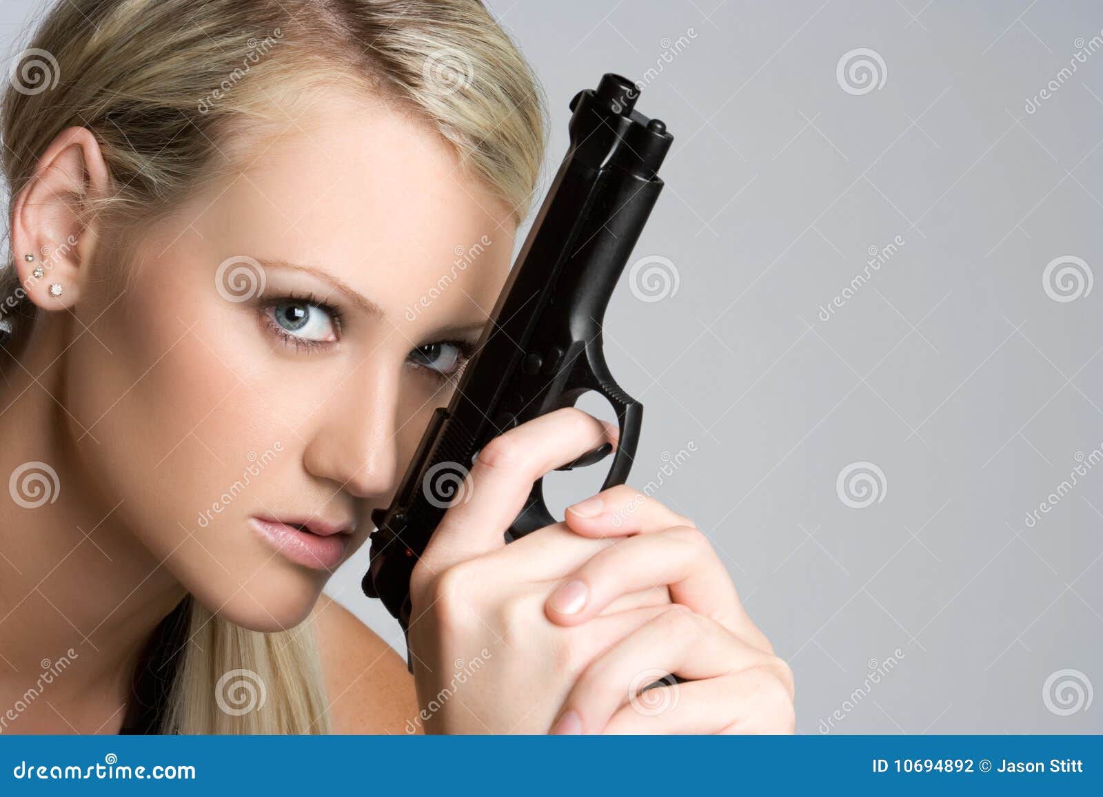 Blond Gun Girl stock photo. Image of grey, women, bond - 10694892