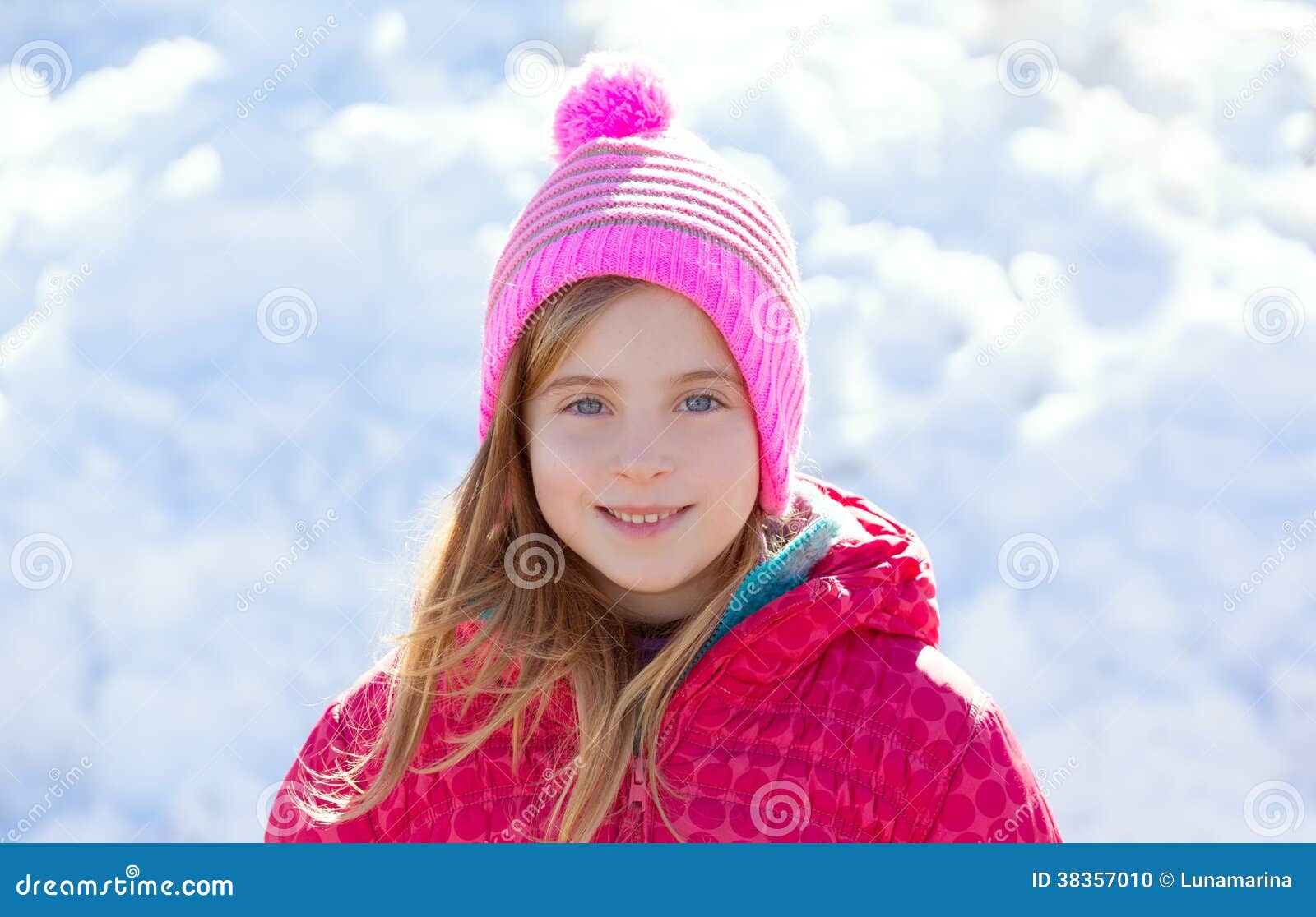 Blond Kid Girl Winter Hat in the Snow Smiling Stock Photo - Image of ...