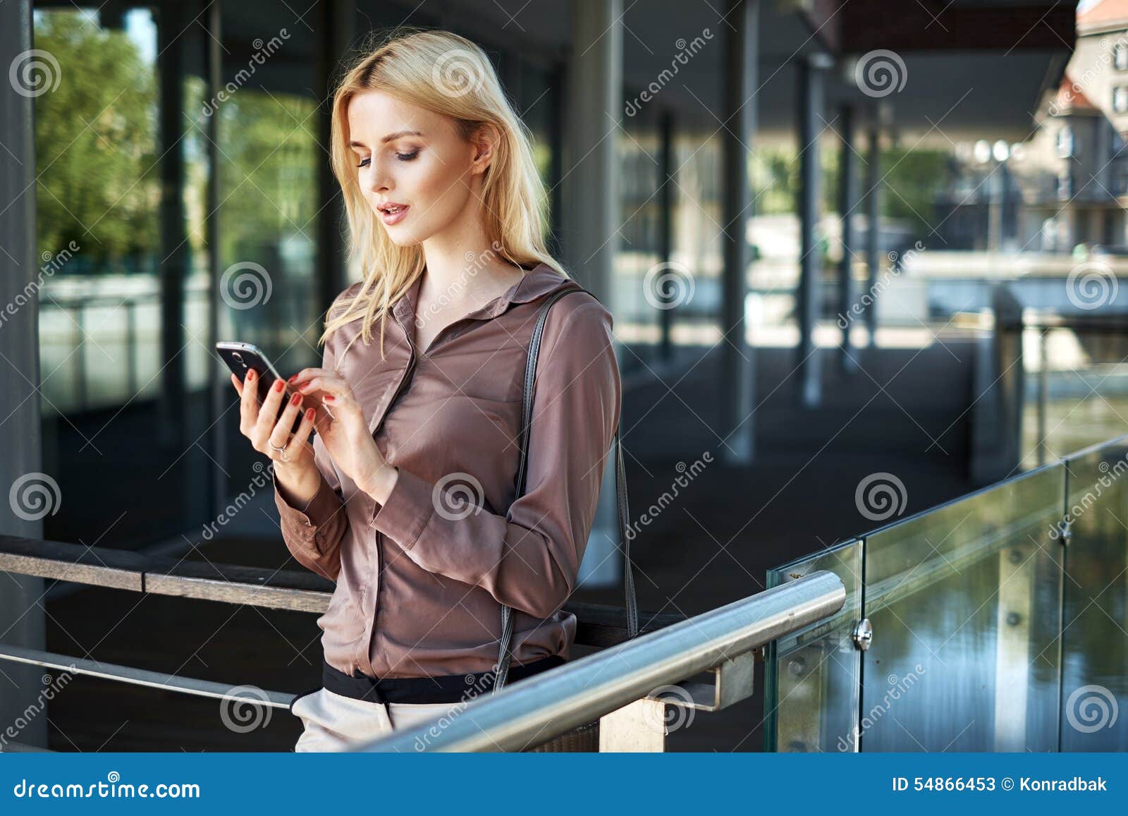 Blond Lady Using Her Smartphone Stock Image - Image of hair, happy ...