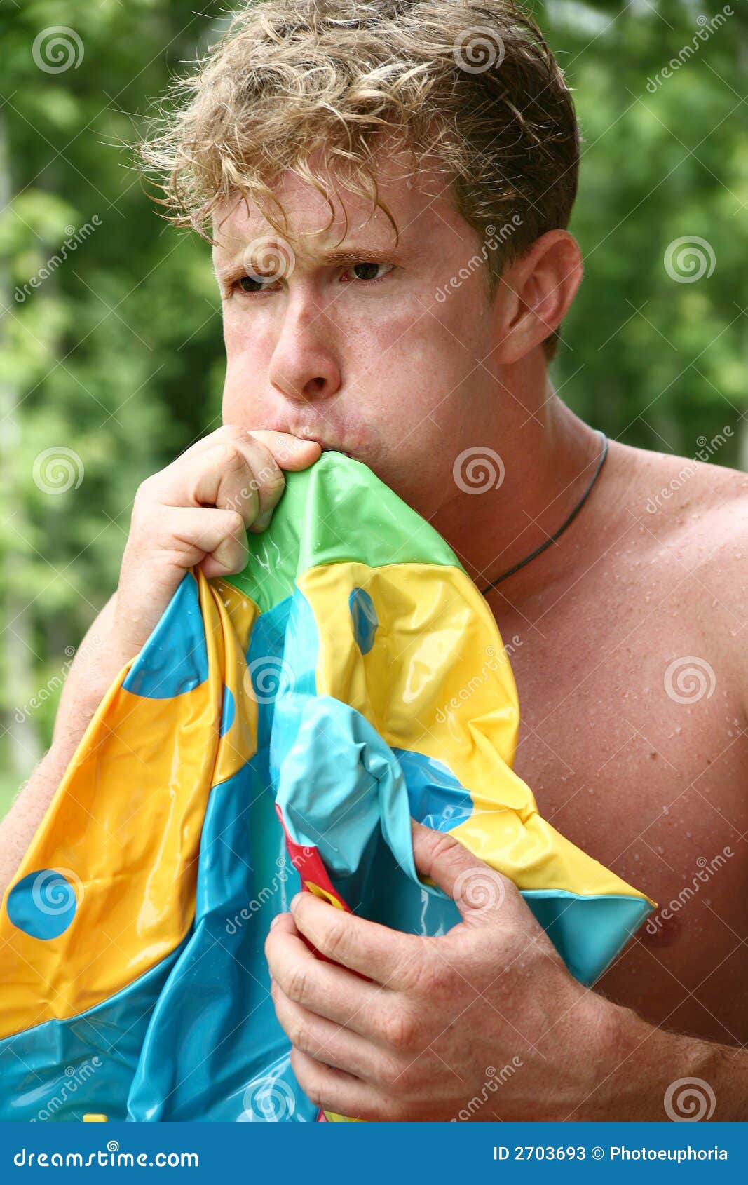 Blond man blowing up stock image. Image of twenty, blow - 2703693