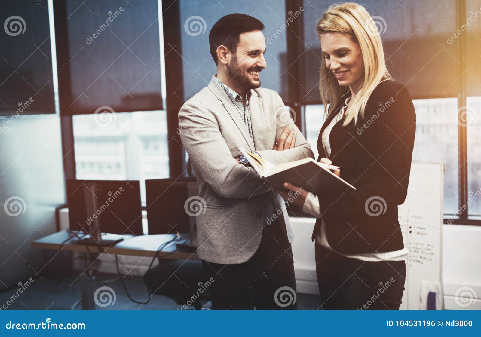 Secretary Helping Boss in Office at Workplace Stock Photo - Image of ...