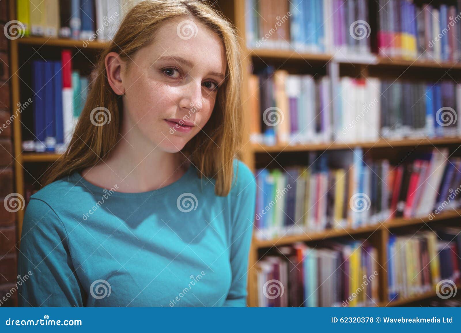 Blond Student in Library Looking at the Camera Stock Photo - Image of ...