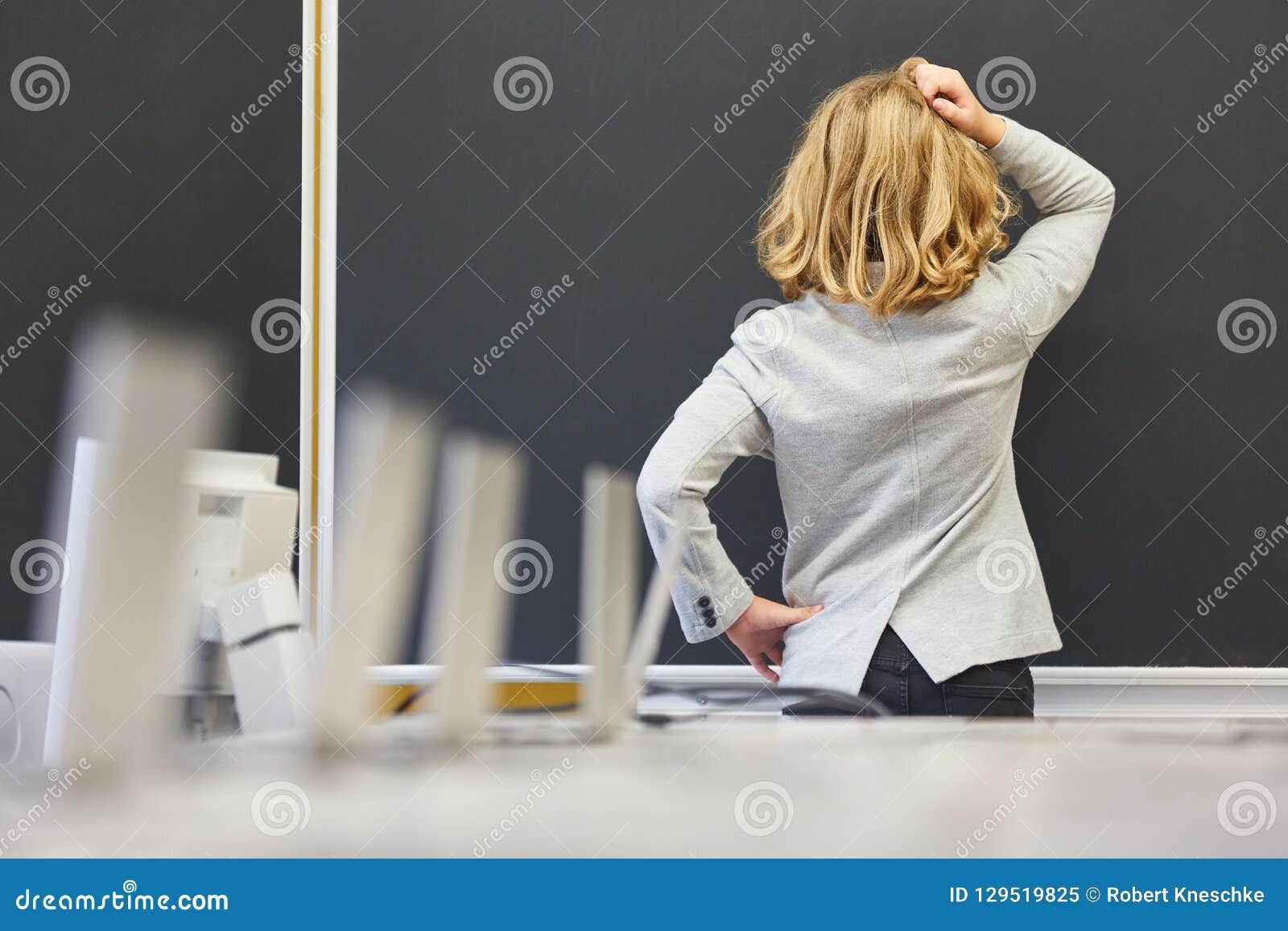 Blond Student Scratching His Head Stock Image - Image of knowledge ...