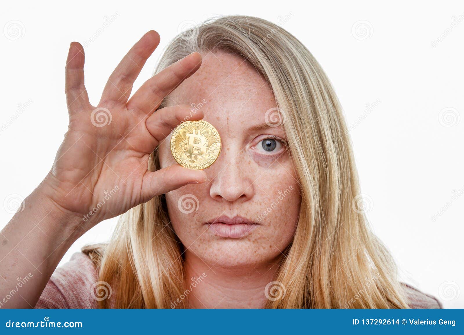 A Blond Woman with a Bitcoin Coin Stock Photo - Image of woman, blue ...