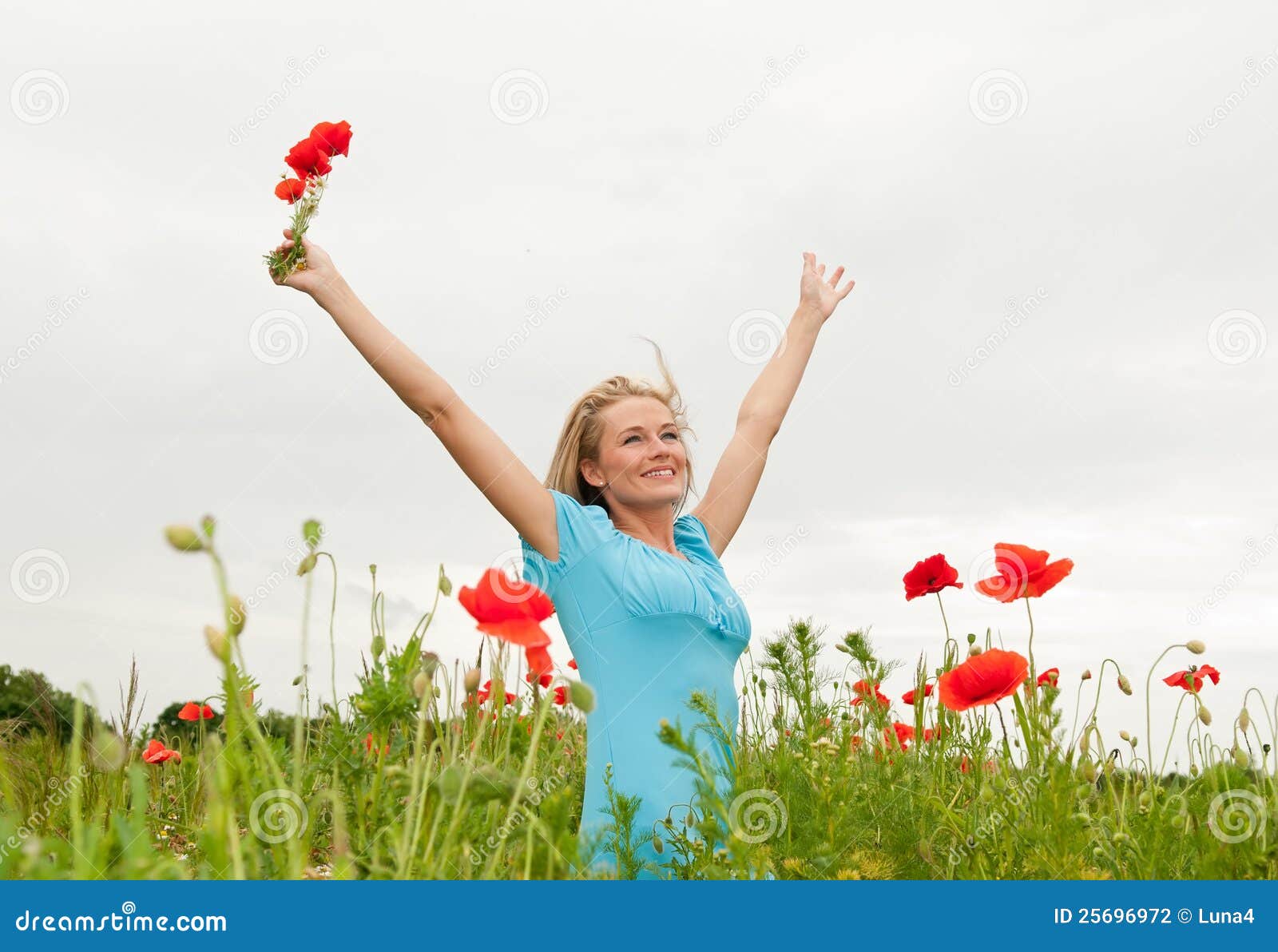 Blond woman cheering stock photo. Image of head, green - 25696972