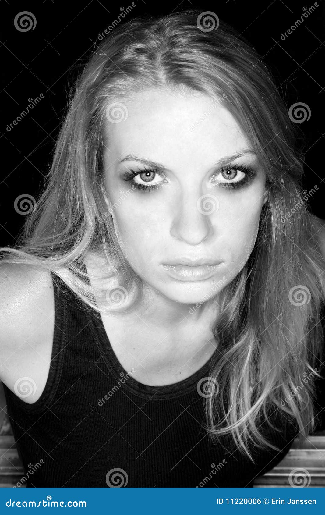 Blond woman glaring stock photo. Image of closeup, black - 11220006