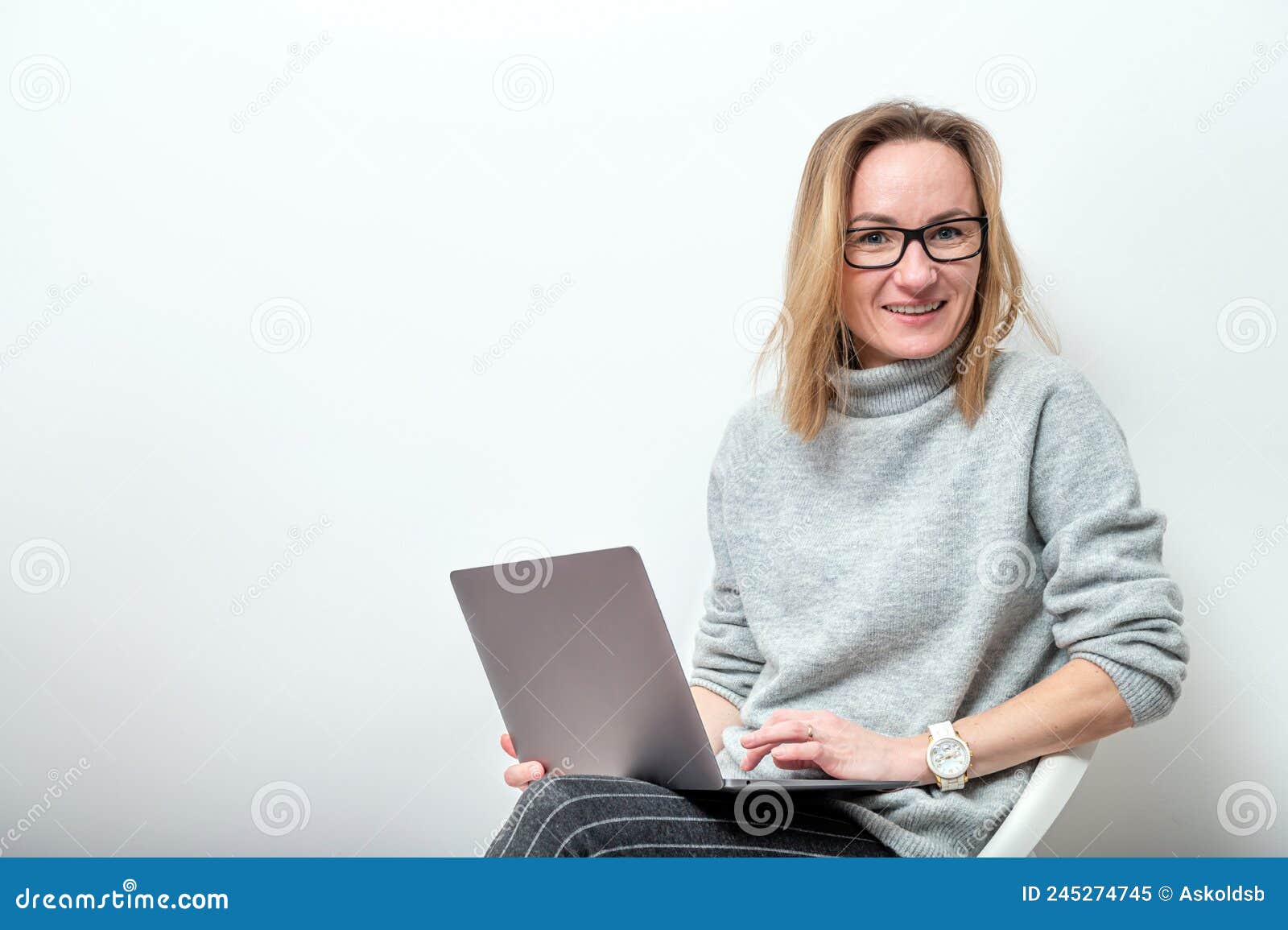 Blond Woman with Glasses Working on Computer, Telecommuting Concept ...