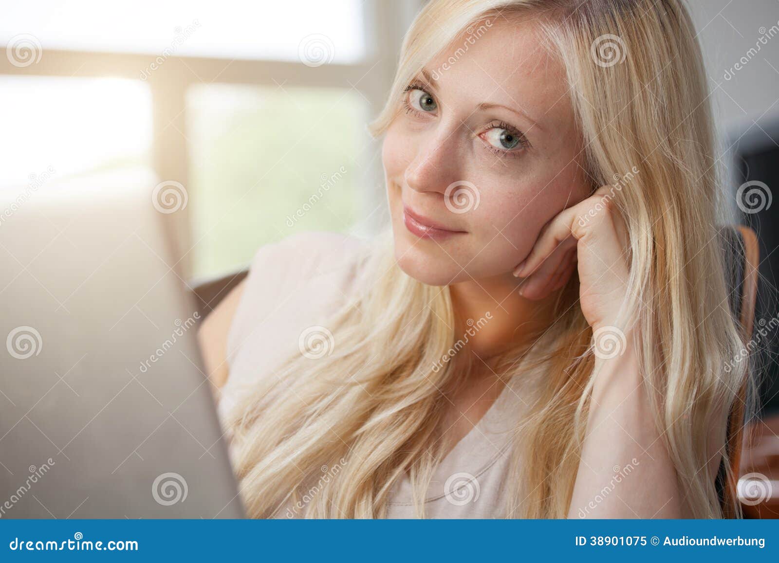 Blond woman with laptop stock image. Image of camera - 38901075