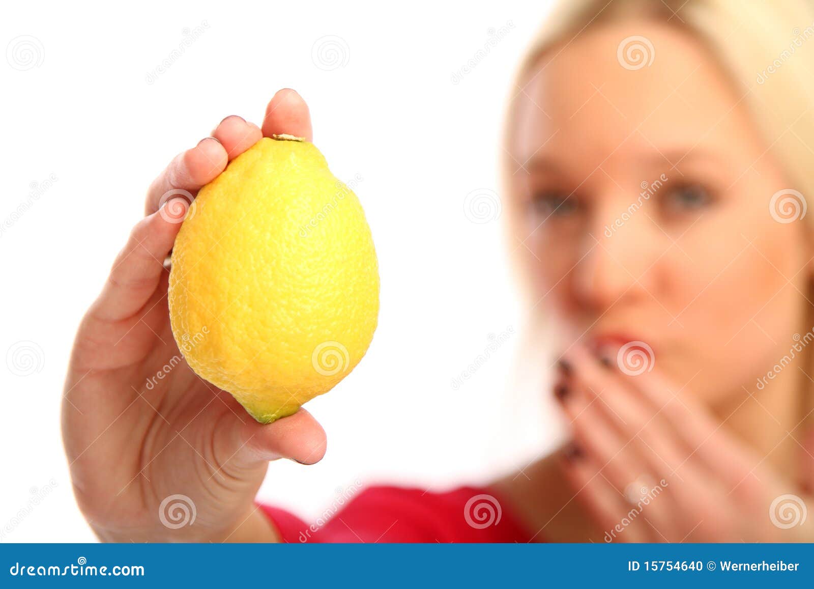 Blond woman with a lemon stock photo. Image of food, citron - 15754640