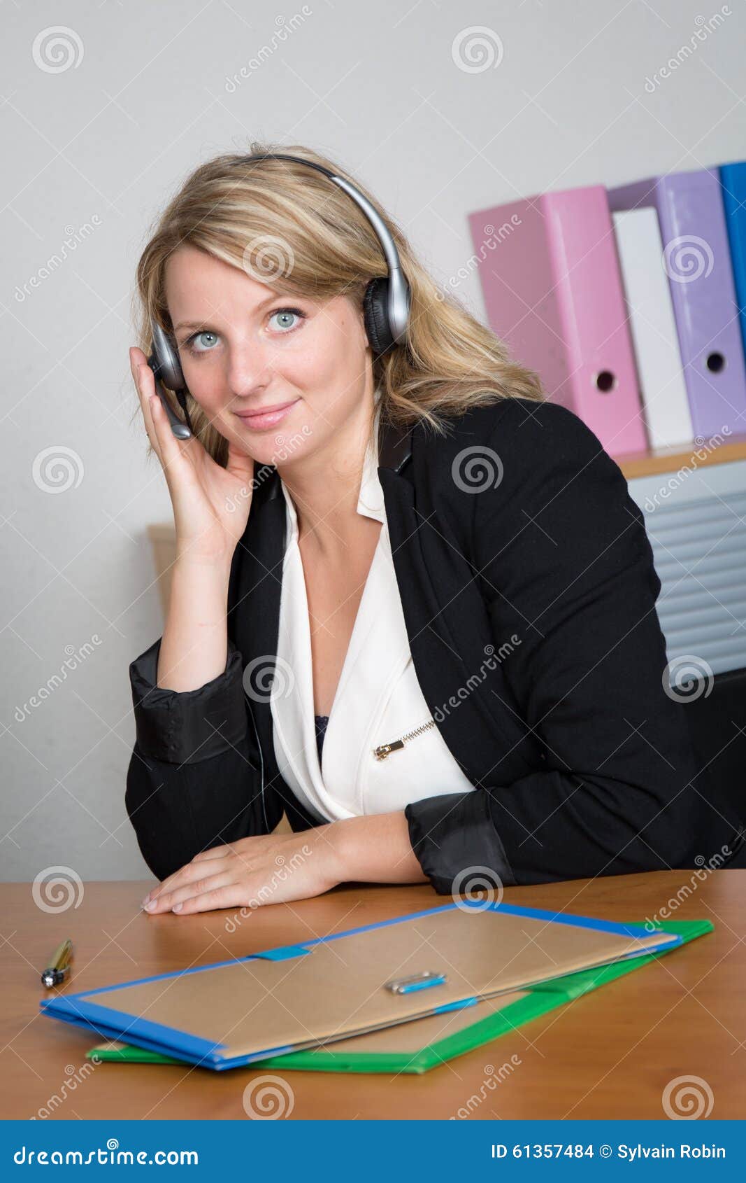 Blond woman receptionist stock photo. Image of lovely - 61357484