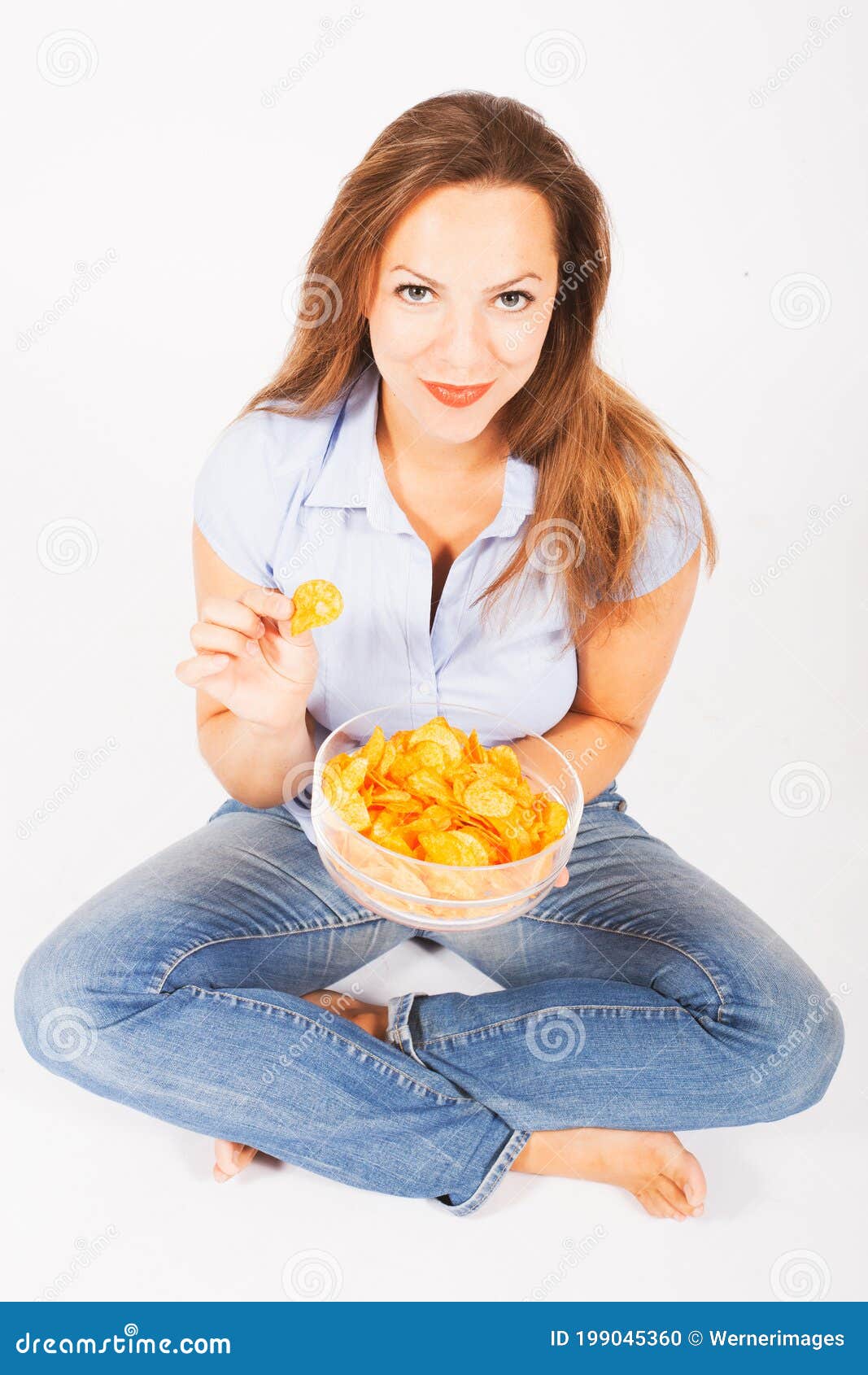 Blond Woman Sitting on Floor and Eating Potato Chips Stock Photo ... Blond Woman Sitting on Floor and Eating Potato Chips Stock Photo ...