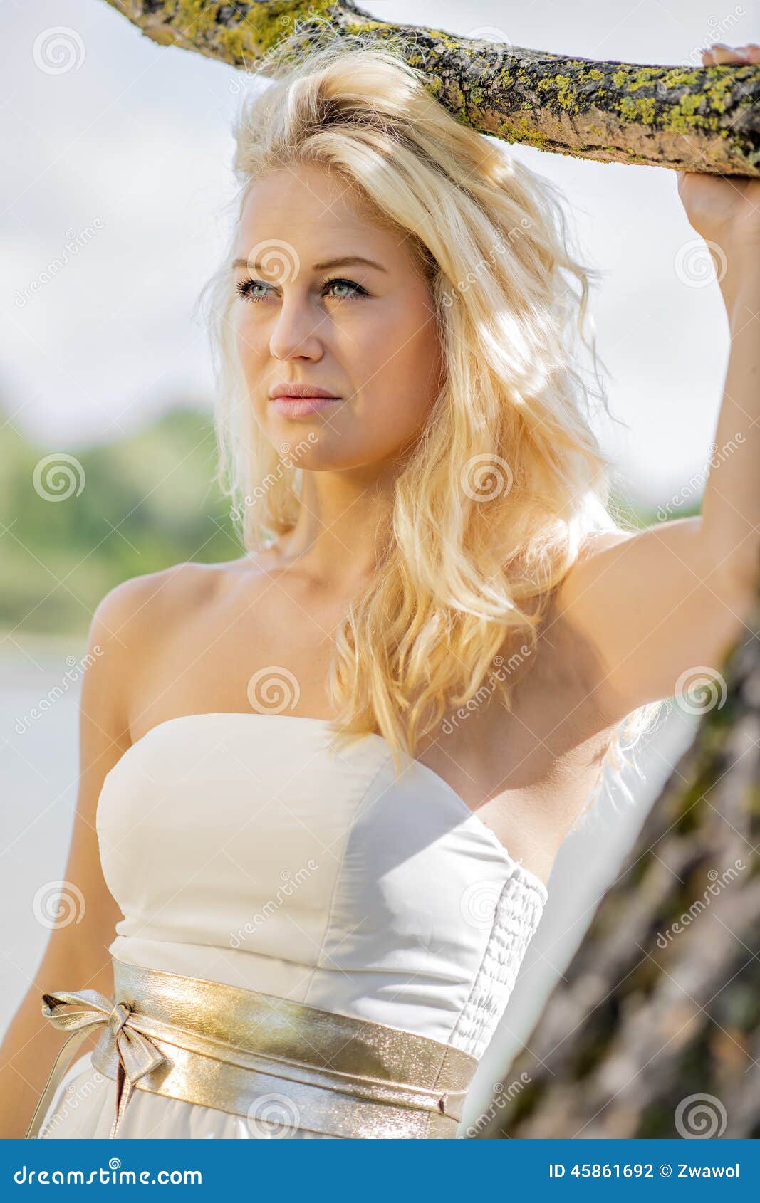 Blond woman under tree stock photo. Image of relaxation - 45861692