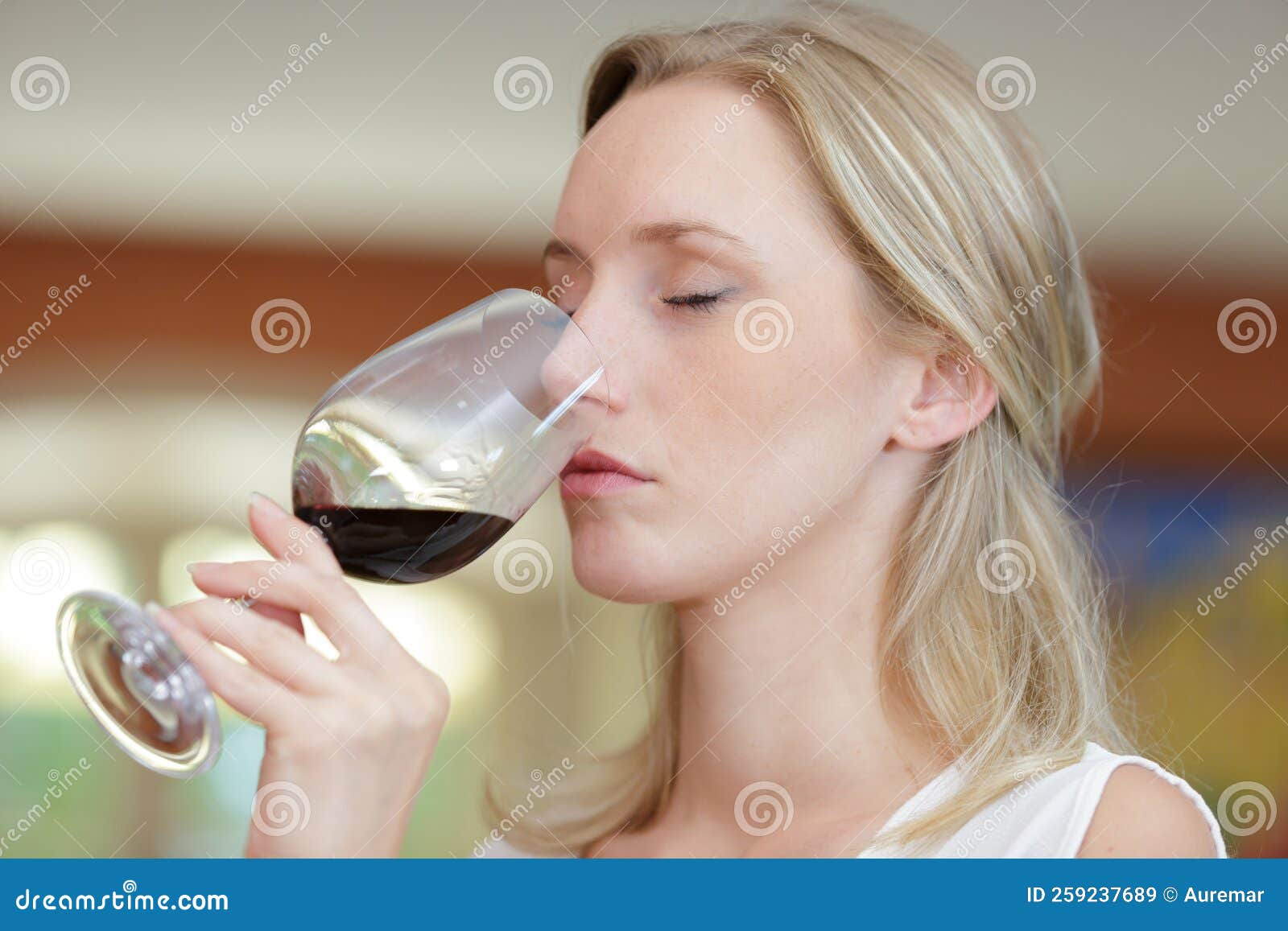 Blond woman wine tasting stock image. Image of meal - 259237689