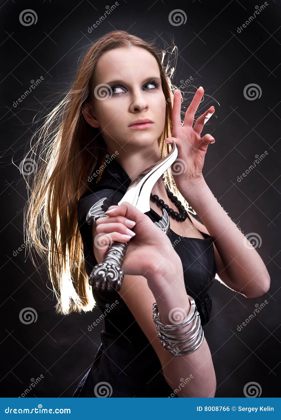 Blond Young Girl Holding Dagger Stock Photo - Image of danger ...