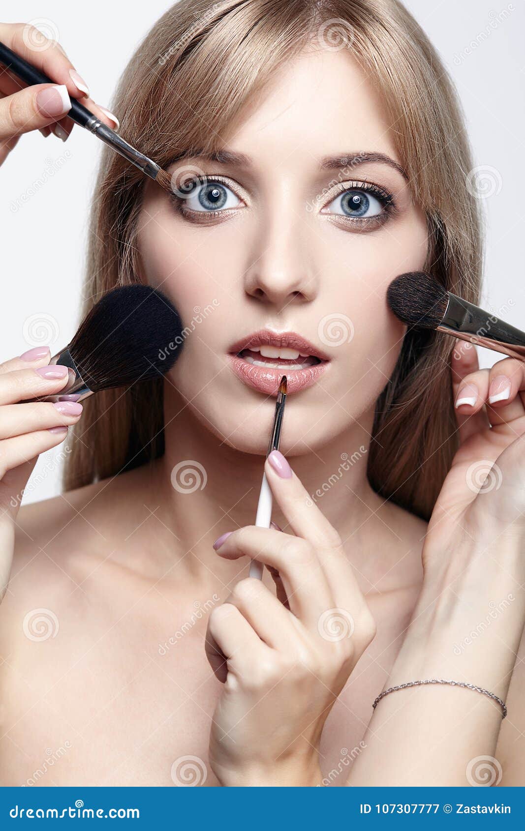 Blonde Beauty Female Stylist Visagist With Makeup Brushes Stock Image