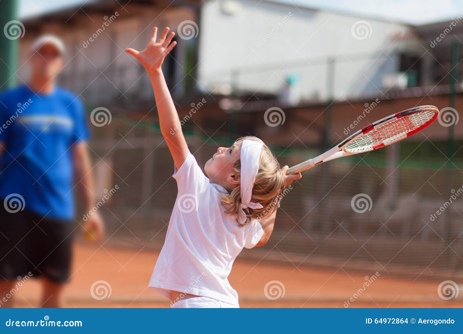 Blonde Boy Practicing Tennis Stock Photo - Image of energy, blue: 64972864