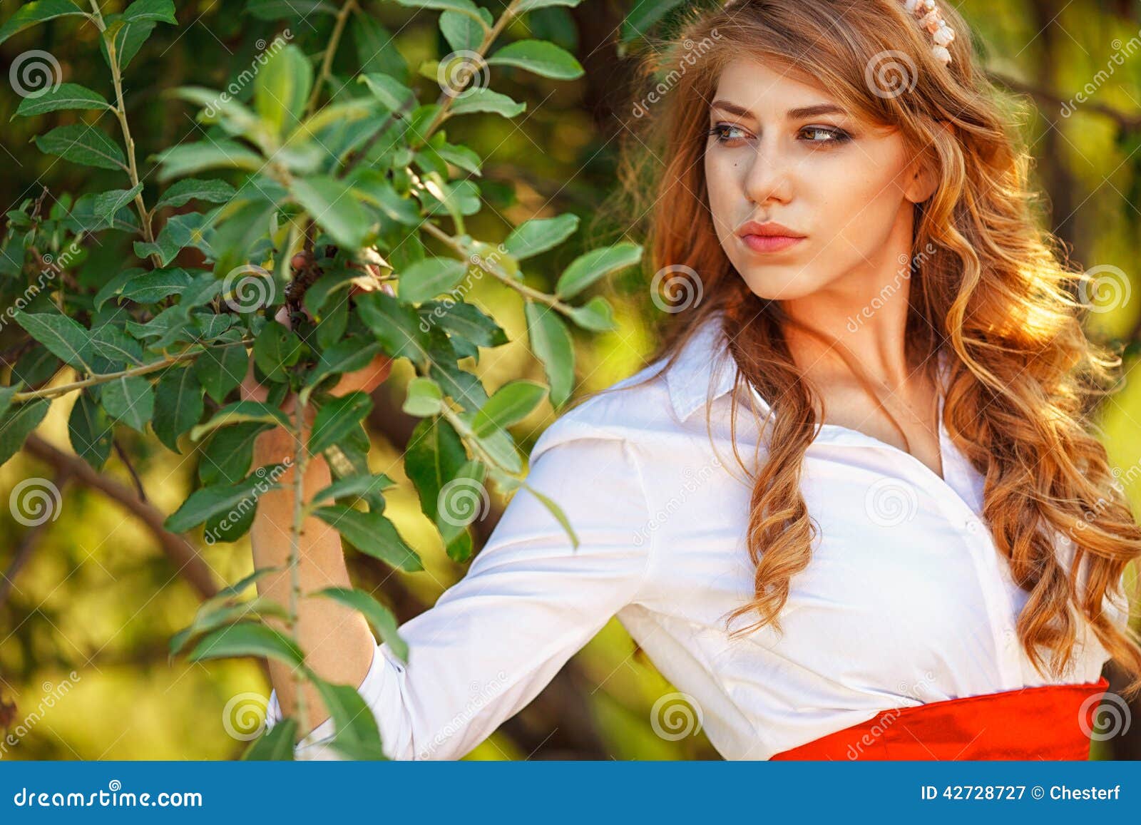 Blonde Curly Woman Standing Under the Tree Stock Image - Image of ...