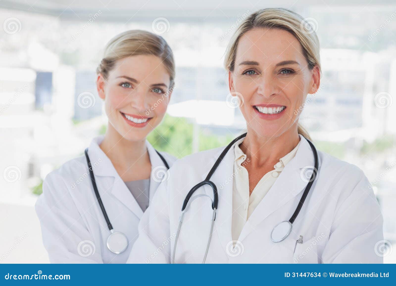 Blonde Doctors Standing Together Stock Photo - Image of adult, portrait ...