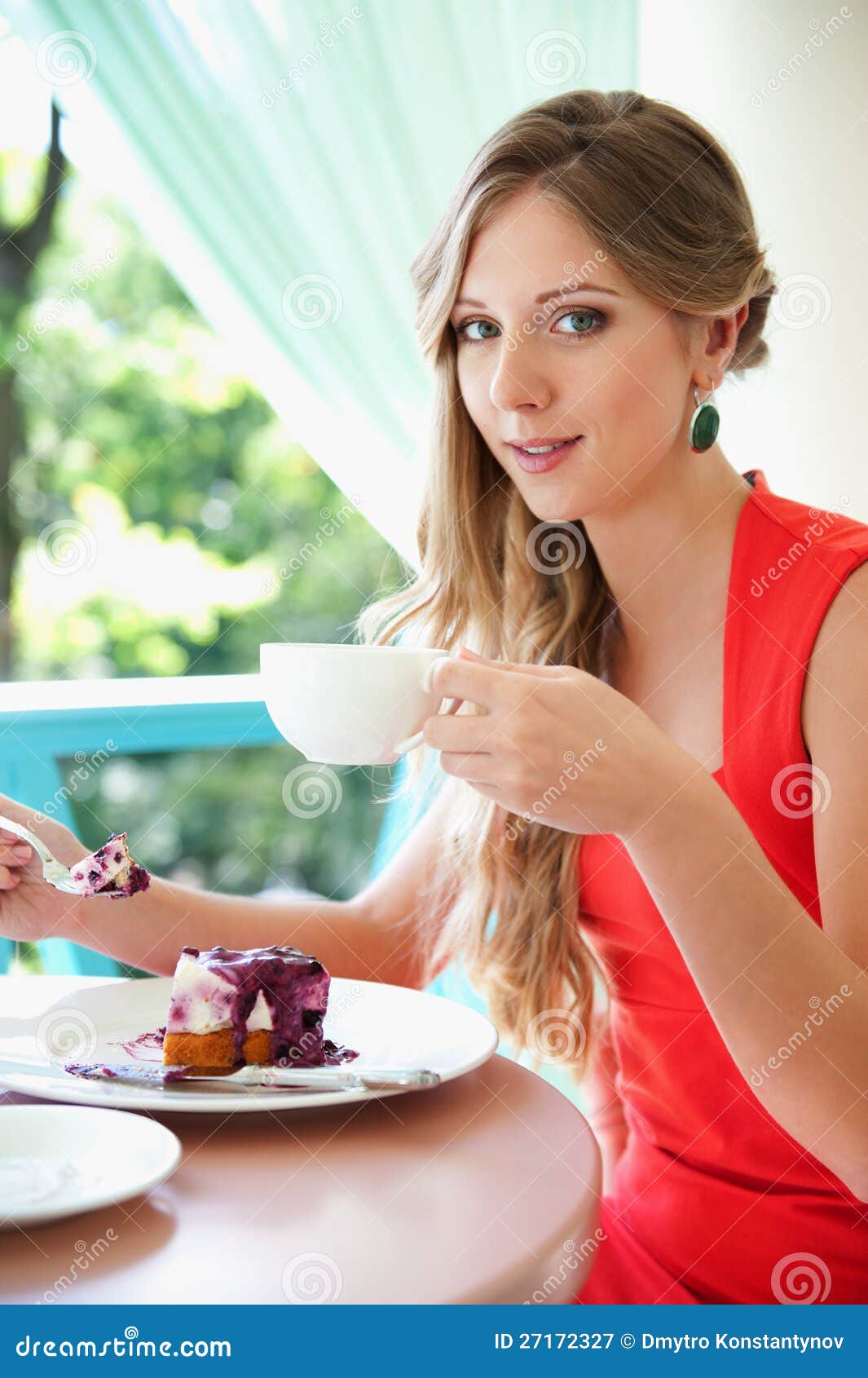 Blonde eating the dessert stock image. Image of restaurant - 27172327