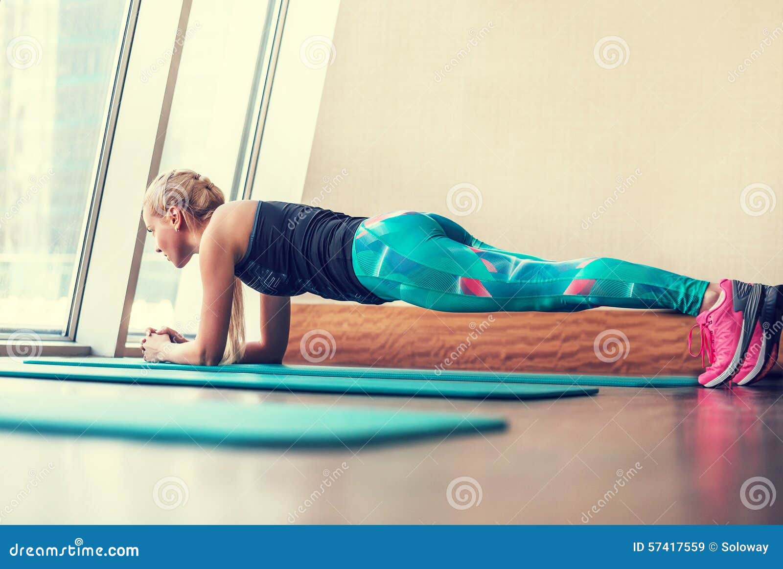 Blonde Female Doing Plank Static Exercise in Gym Stock Image - Image of ...