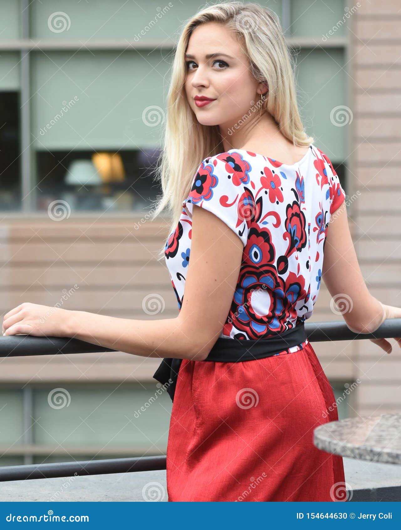 Blonde Female Model Posing by a Railing Stock Photo - Image of posing ...