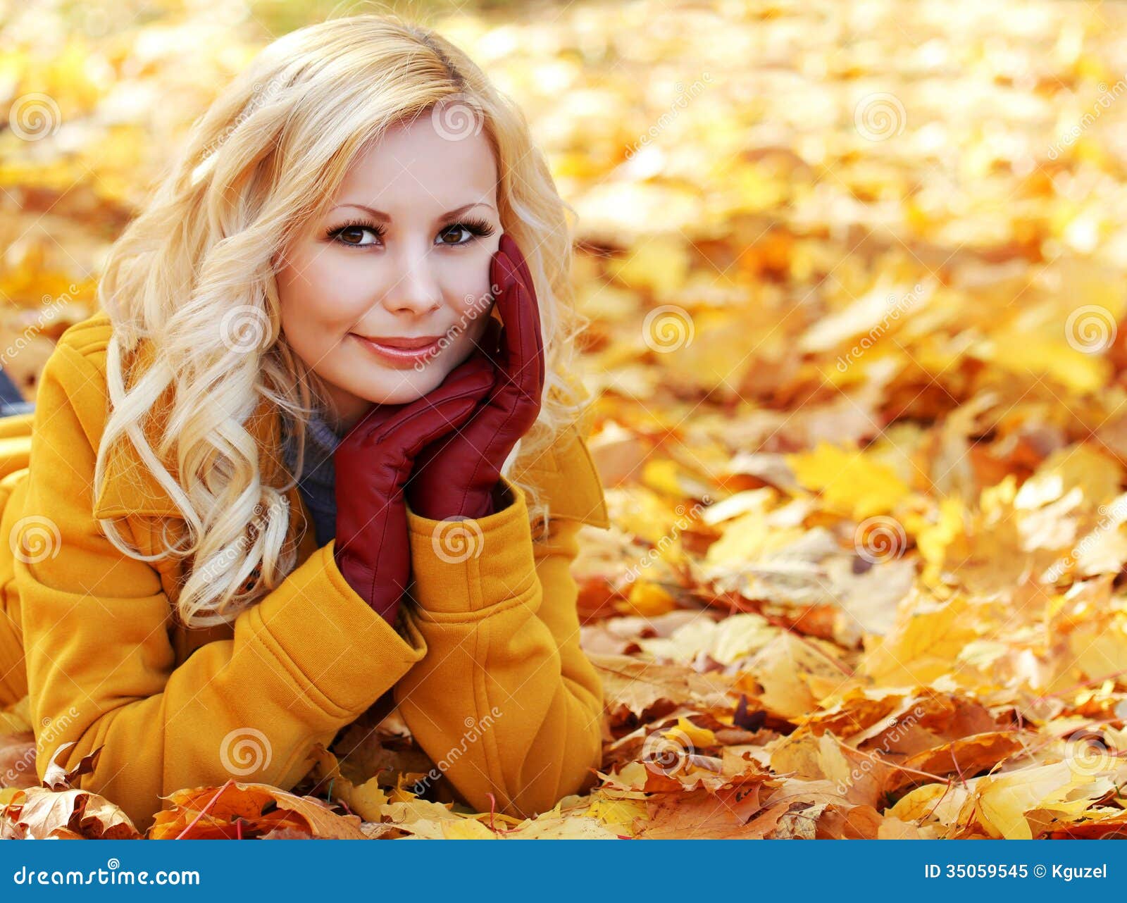 Blonde Girl In Autumn Park With Maple Leaves Fashion Beautiful Stock