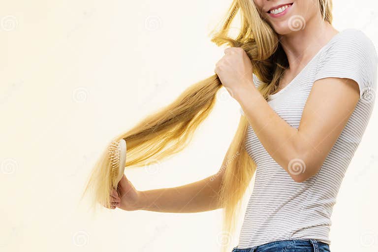Blonde Girl Brushing Her Long Hair Stock Image Image Of Care Long