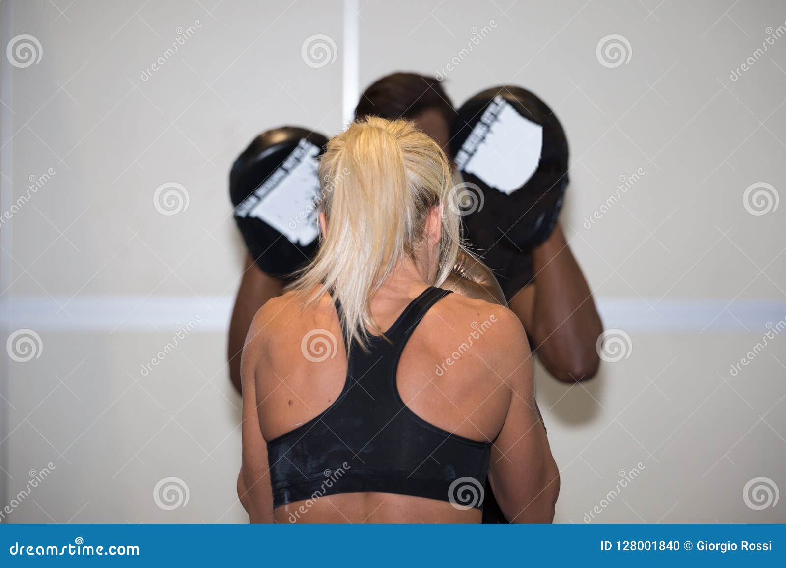 Blonde Girl Doing Fitness And Boxing Workout At Gym Editorial Image