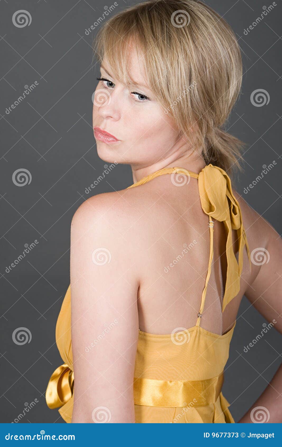 Blonde Girl Looking Over Her Shoulder Stock Image - Image of emotion ...