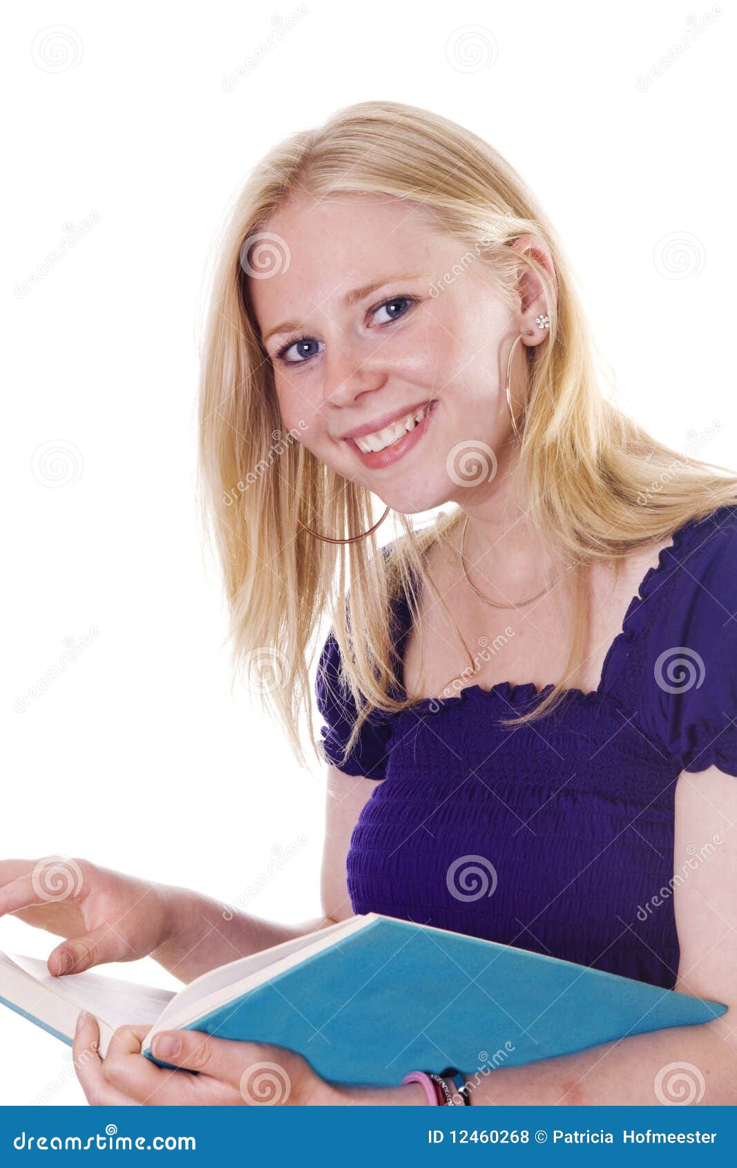 Blonde Girl Looking Up from Study Book Smiling Stock Photo - Image of ...