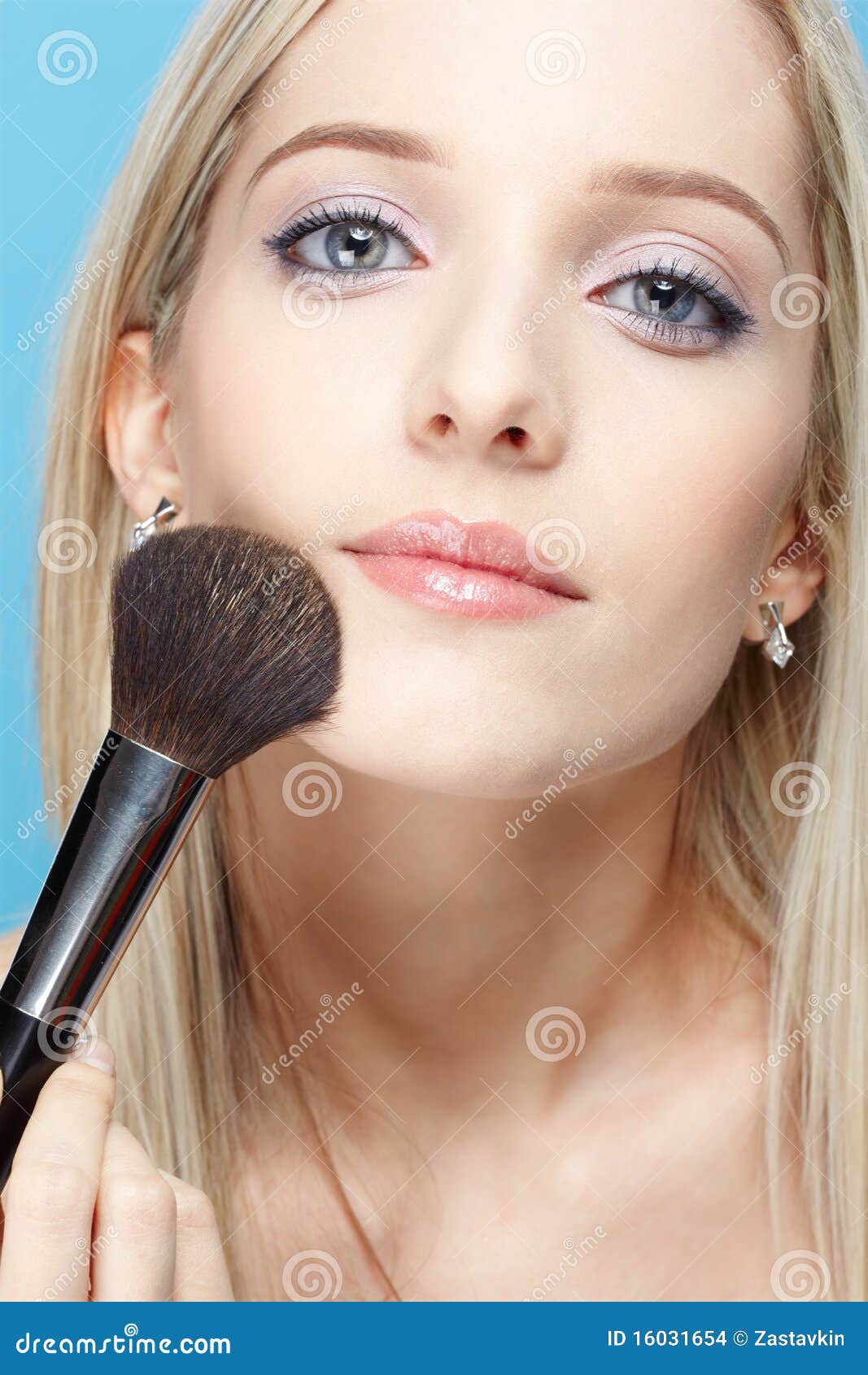 Blonde girl making up stock photo. Image of hairdo, skincare - 16031654