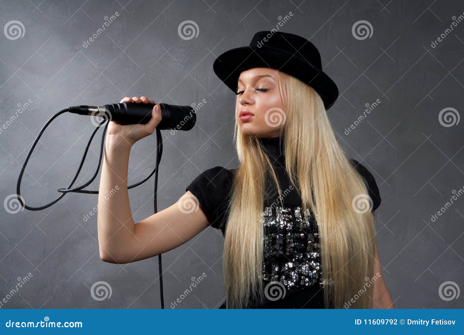 Blonde Girl with Microphone Stock Photo - Image of young, lifestyle ...