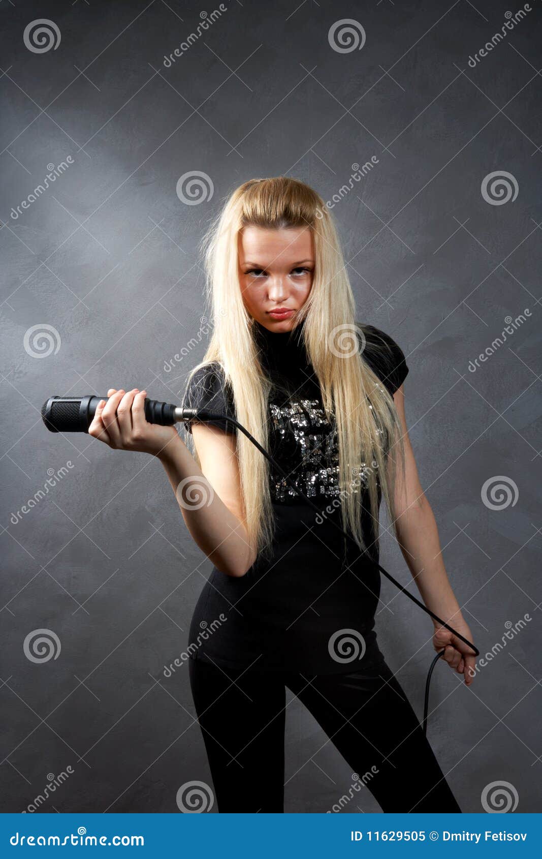 Blonde Girl with Microphone Stock Image - Image of sound, studio: 11629505