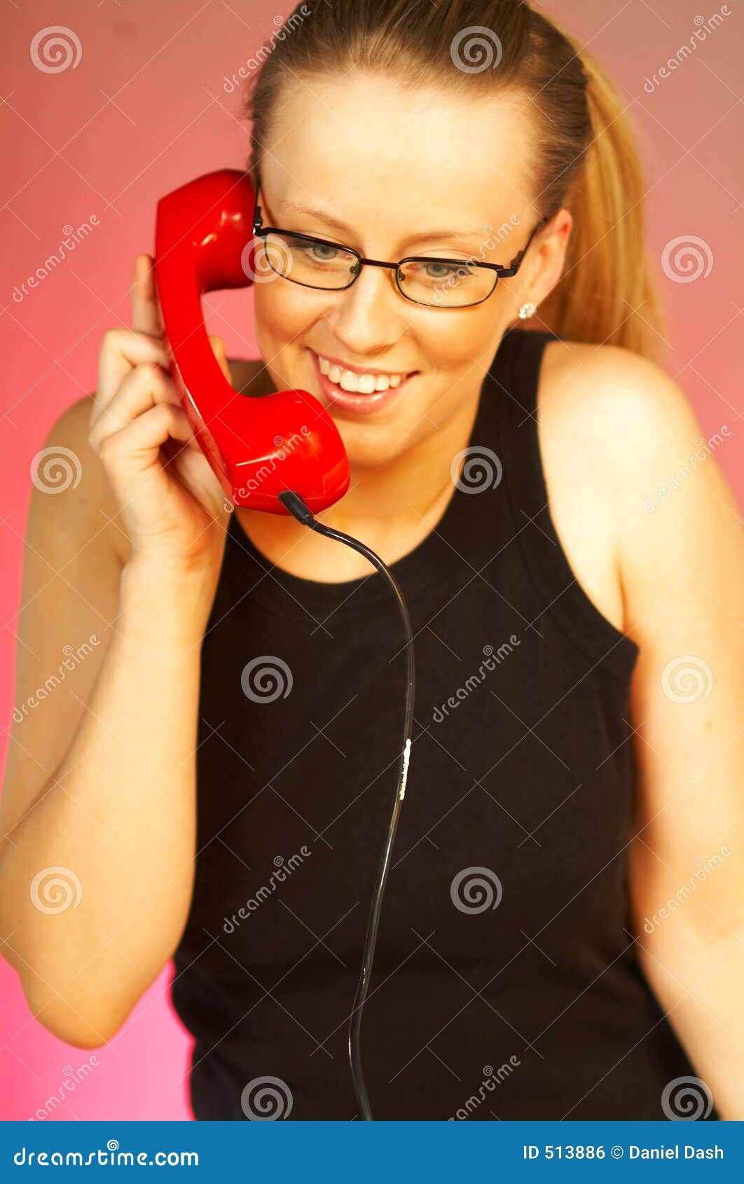 Blonde girl with red phone stock photo. Image of honest - 513886