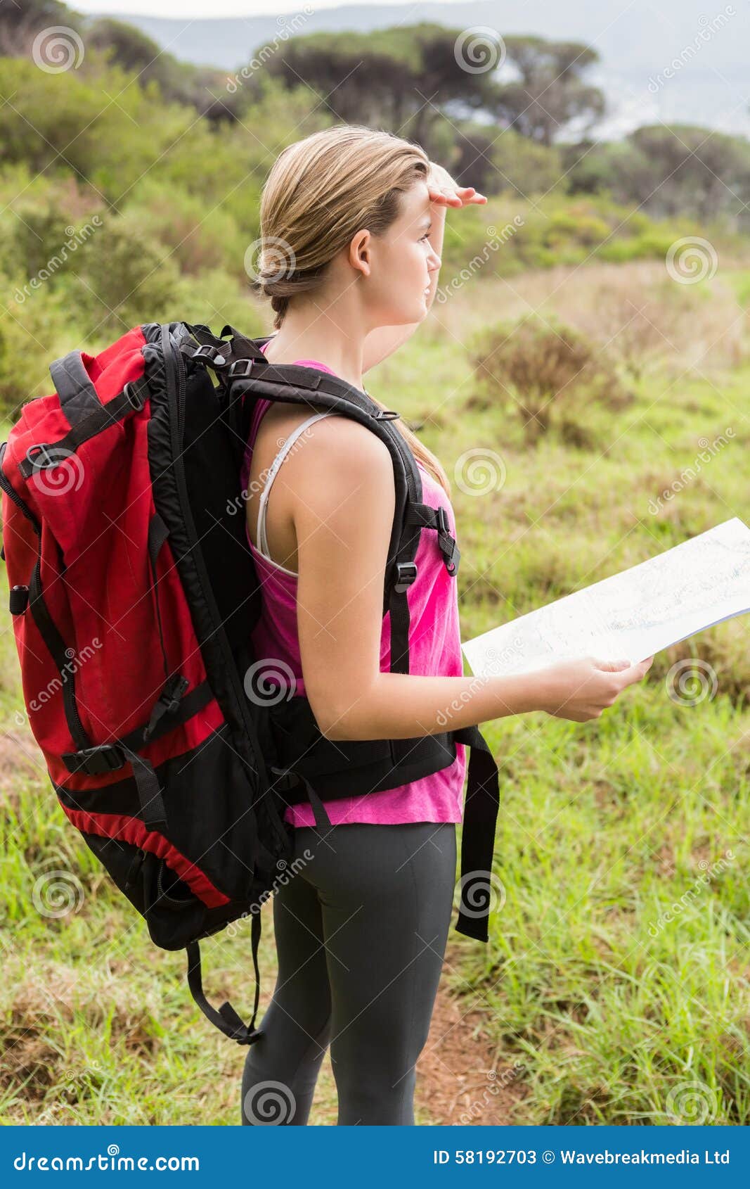 Blonde Hiker with Map Searching for Path Stock Image - Image of hair ...