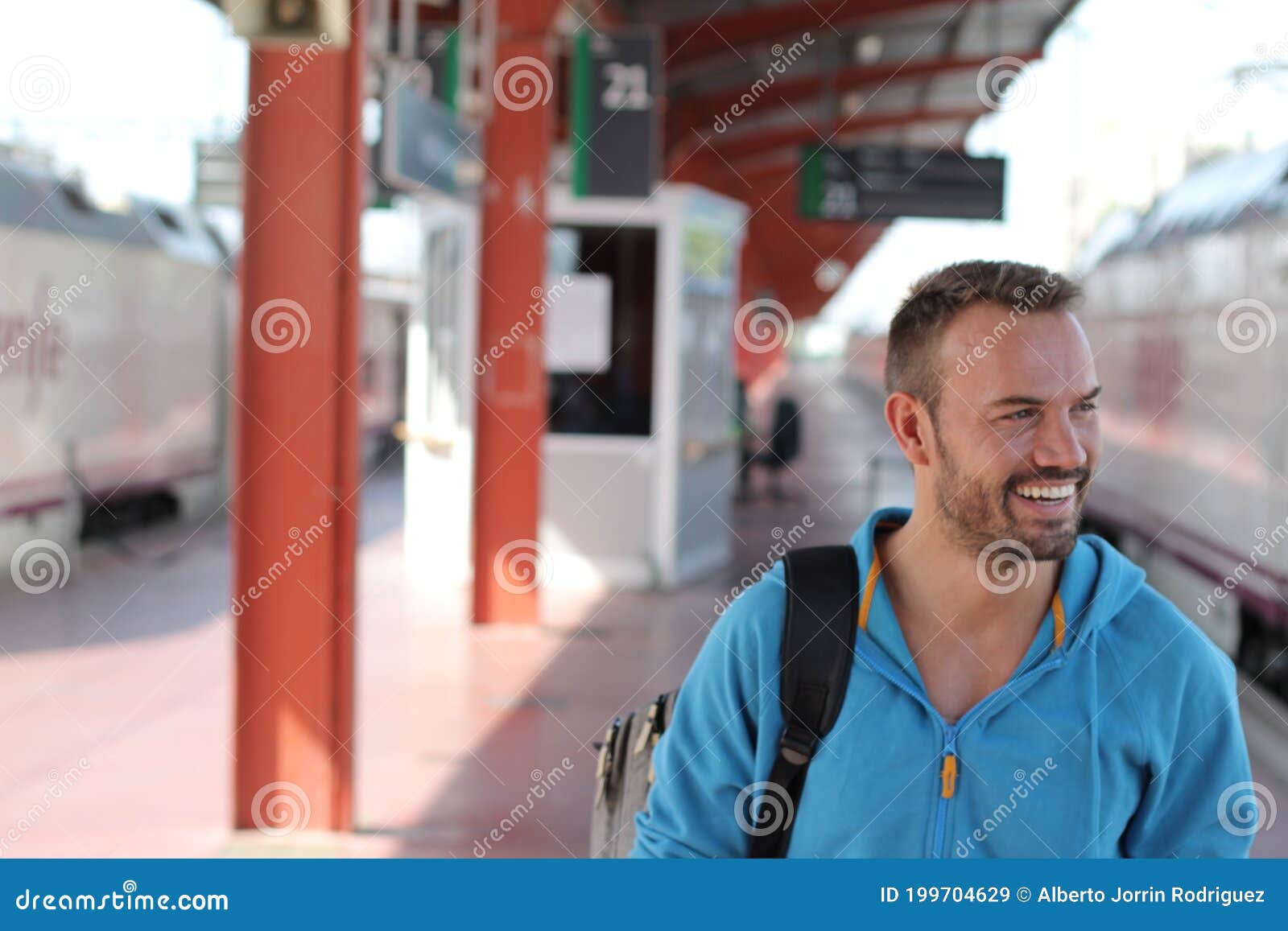 Blonde Man Smiling in Train Station Stock Image - Image of german ...
