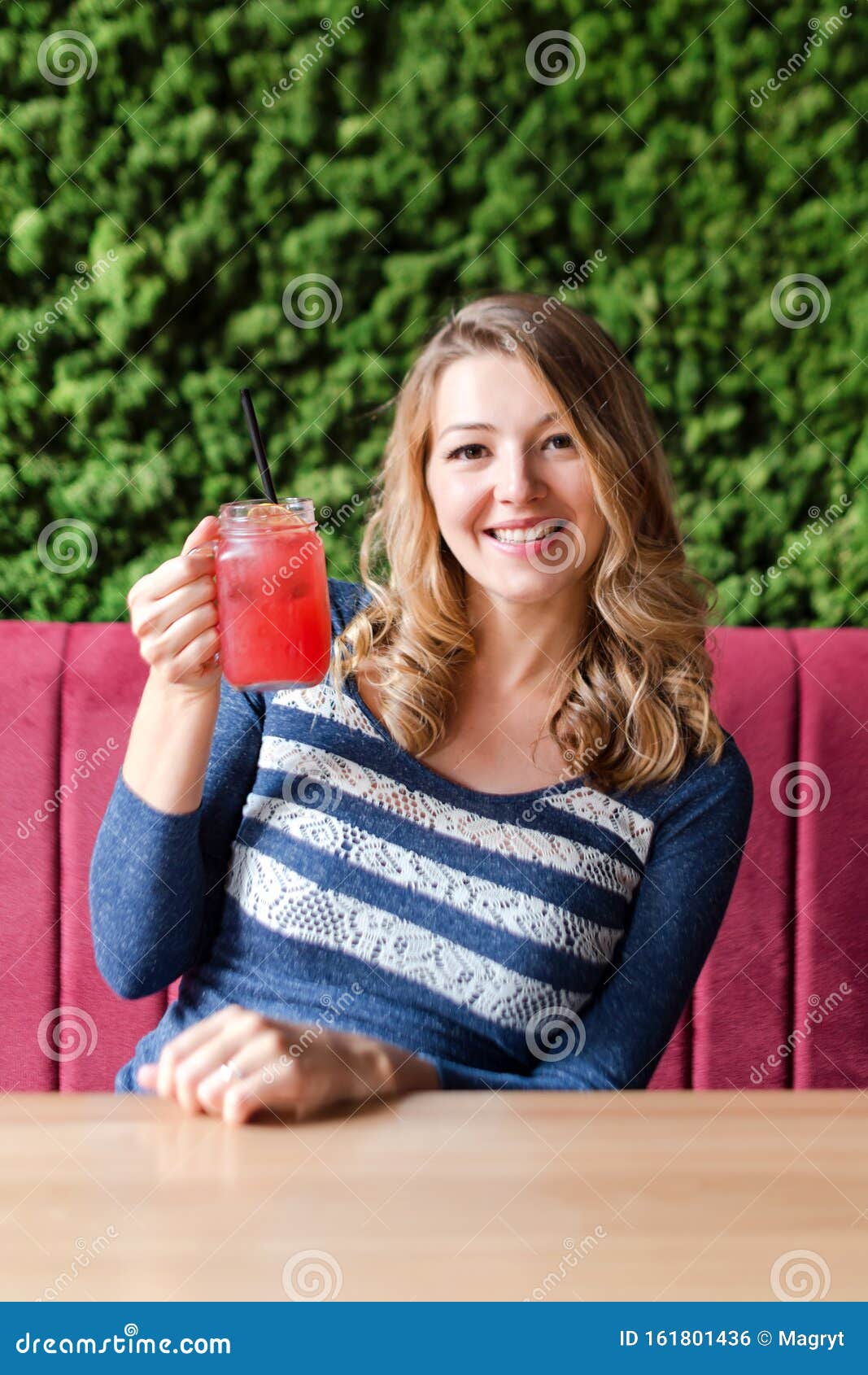Blonde Pretty Woman Drinking Lemonade in Cafe. Stock Photo - Image of ...