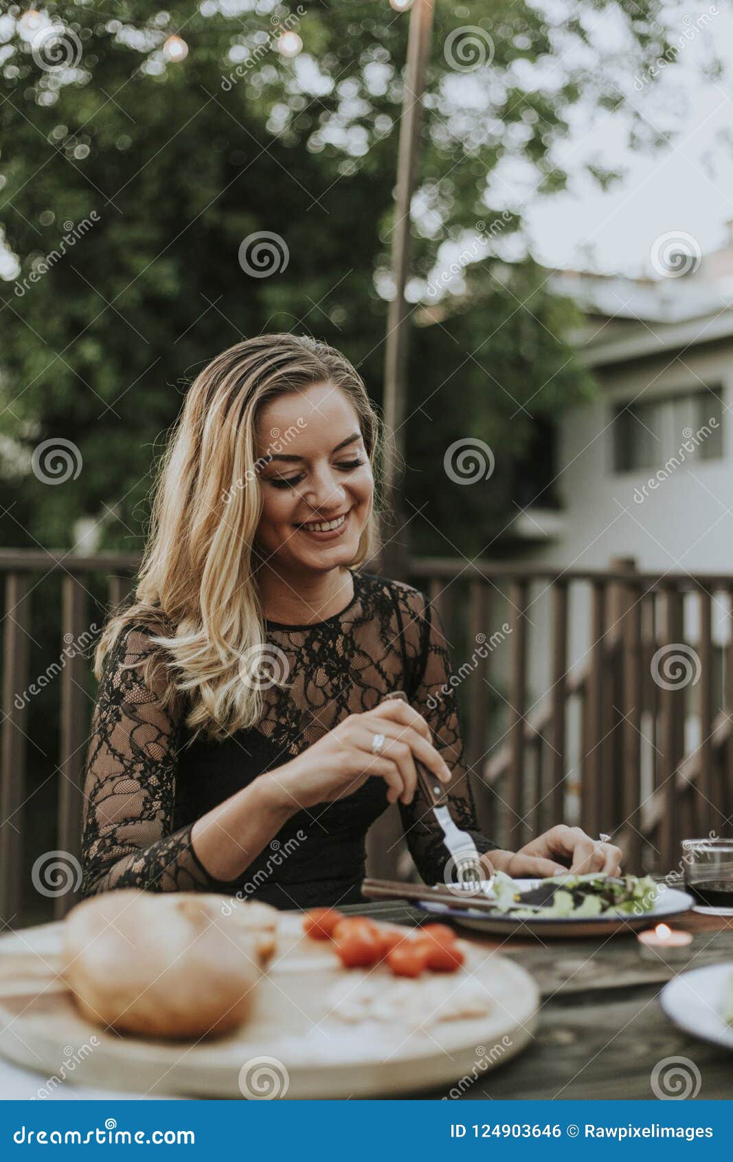 Blonde Woman at a Bbq Party Stock Photo - Image of long, bread: 124903646
