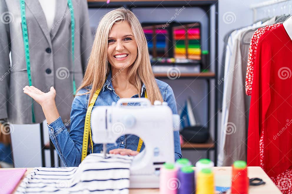 Blonde Woman Dressmaker Designer Using Sew Machine Smiling Cheerful