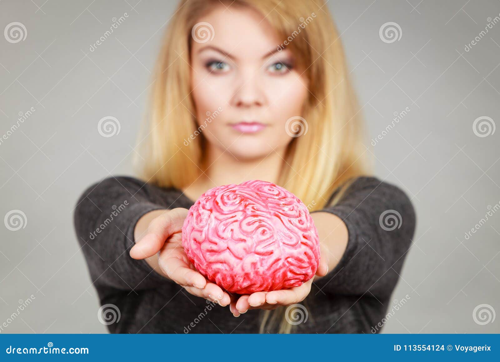 Woman Holding Brain Having Idea Stock Photo - Image of wondering, idea ...