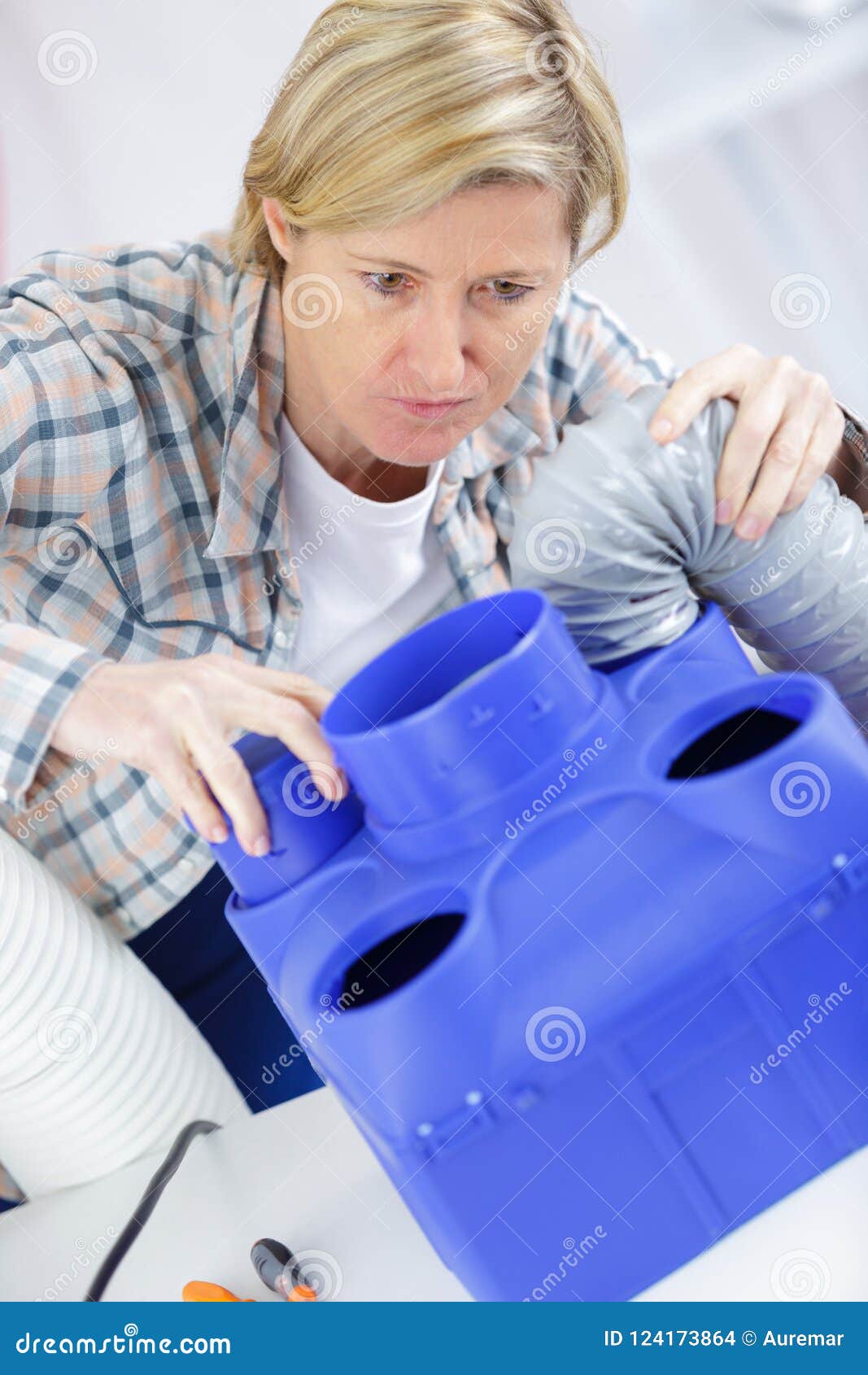 Blonde Woman Installing New Ac System Stock Photo - Image of unhealthy ...
