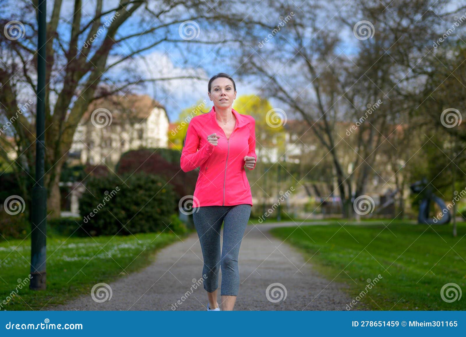 Blonde Woman Jogging in the Park Stock Image - Image of attractive ...