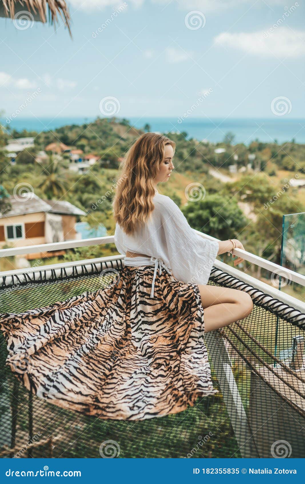 Blonde Woman Sitting in Net on a High Stock Image - Image of travel ...