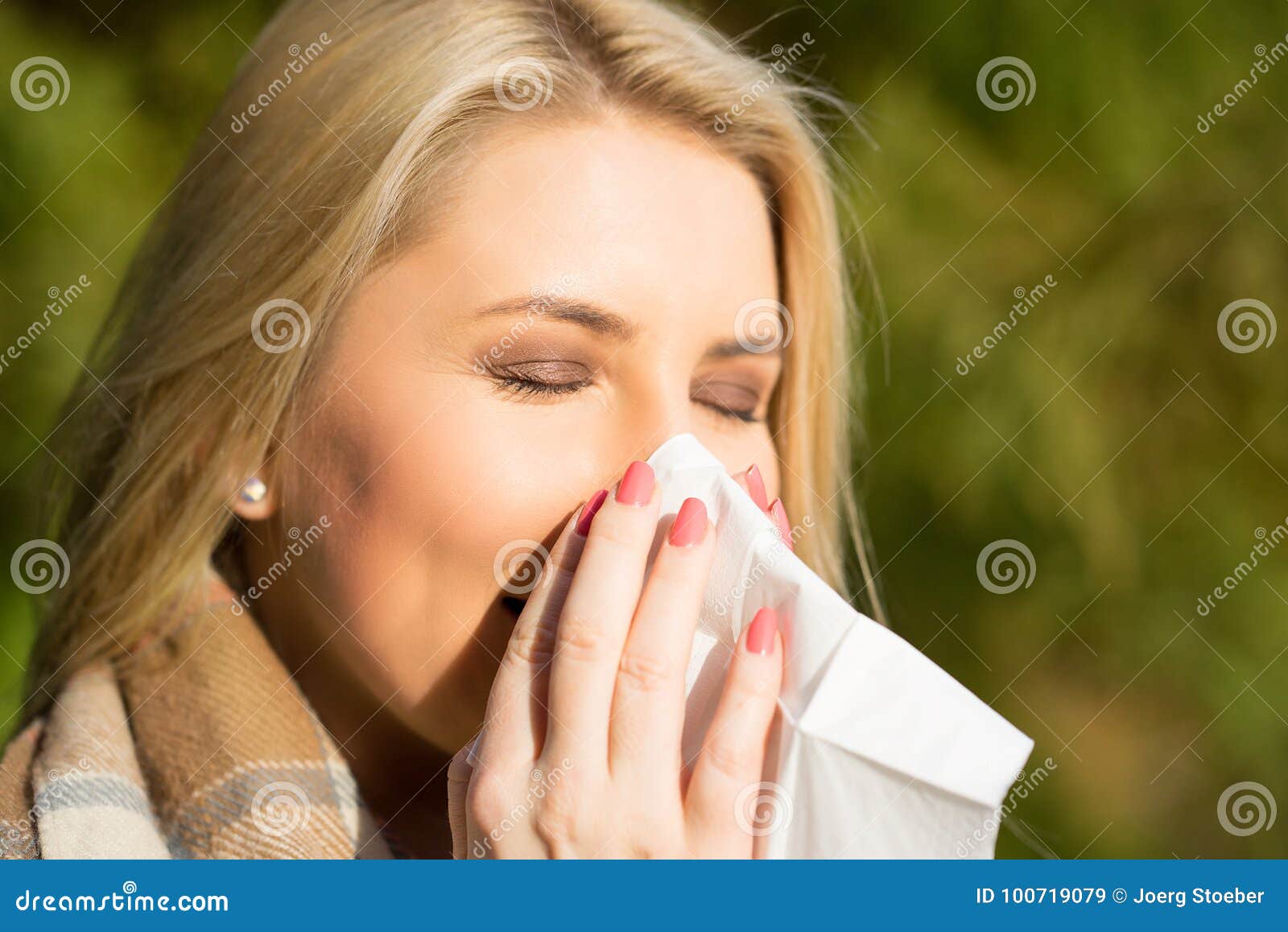 Blonde Woman Sneezing in Tissue Stock Image - Image of outdoors ...