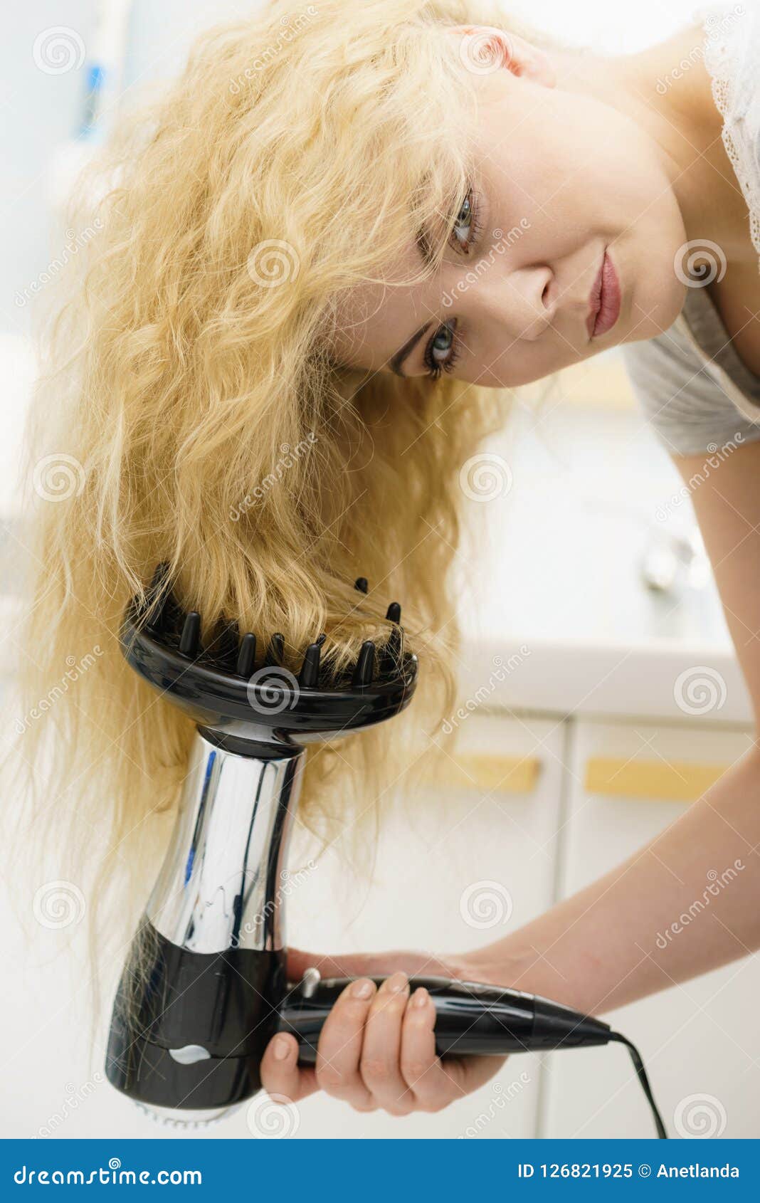 Blonde Woman Using Hair Dryer Stock Image Image Of Hair Hairdryer