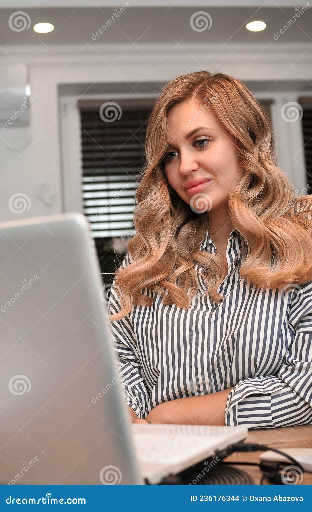 Blonde Woman Working at the Computer Stock Photo - Image of face, room ...