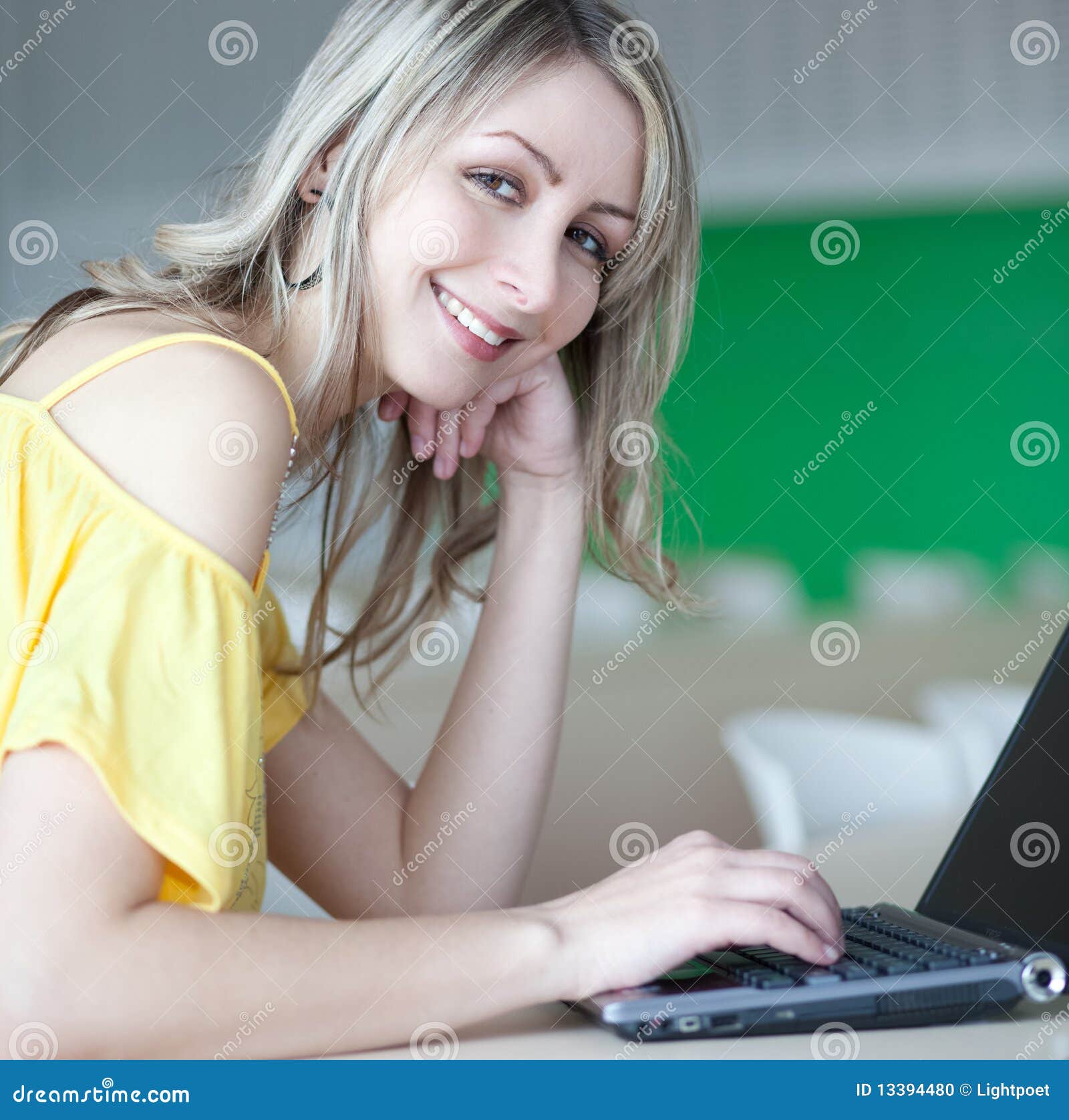 Blonde Woman Working on a Laptop Stock Photo - Image of adult, computer ...