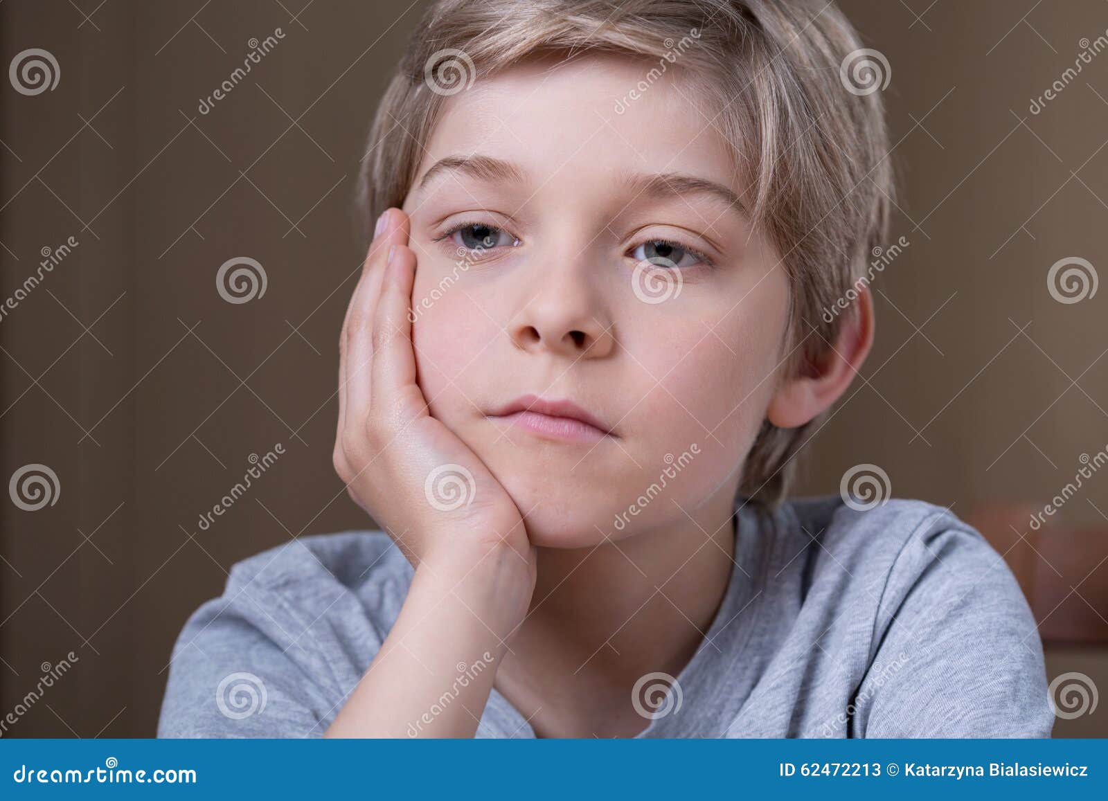 Blonde young boy thinking stock image. Image of schoolboy - 62472213